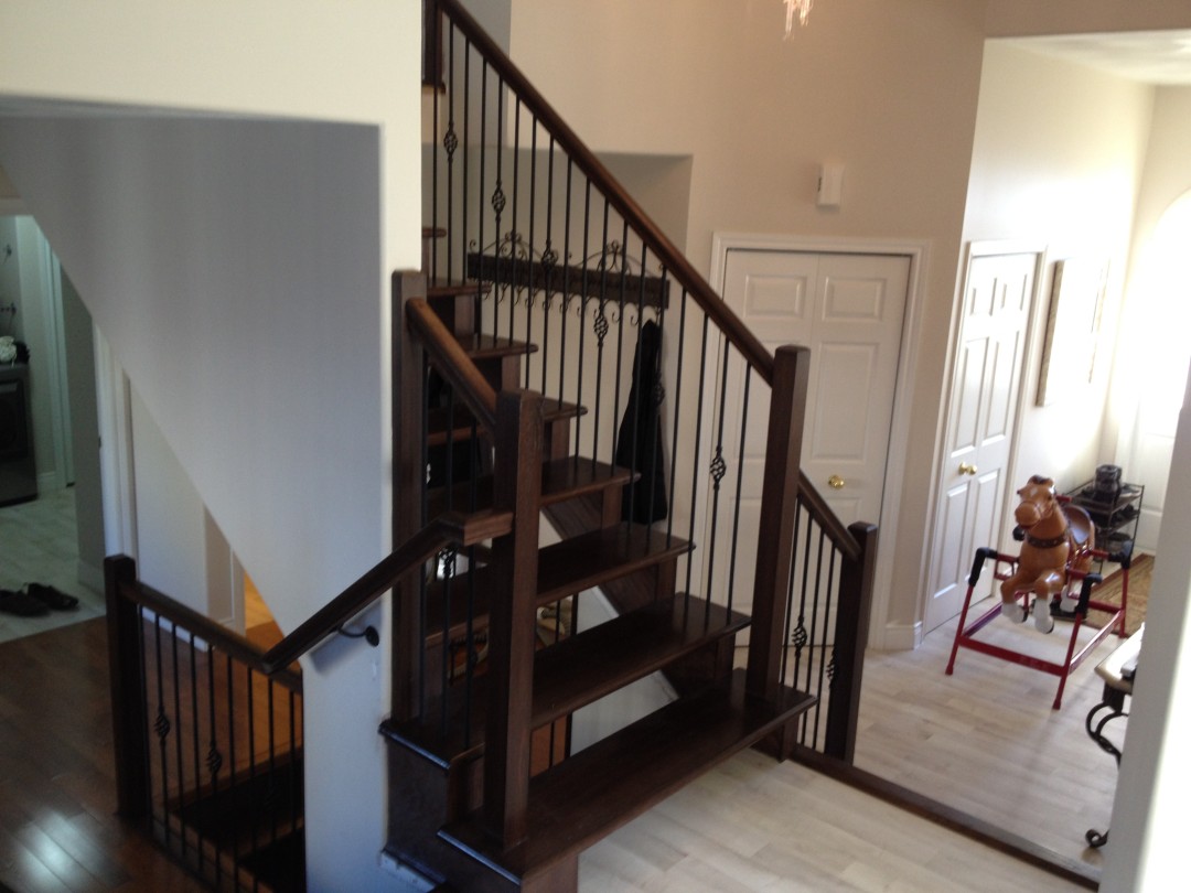 Custom open riser staircase with birdcage wrought iron spindles | KP ...