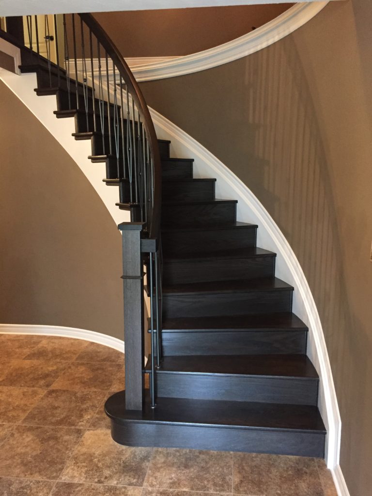 modern curved railing with painted stringers | KP Carpentry